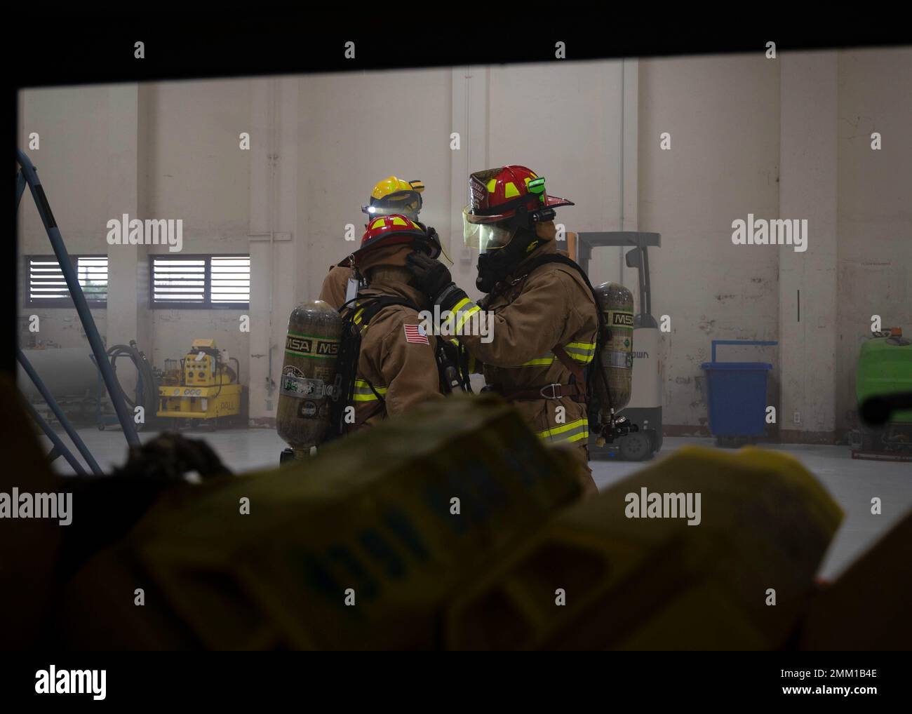 A U.S. Air Force firefighter assigned to the 36th Civil Engineer ...
