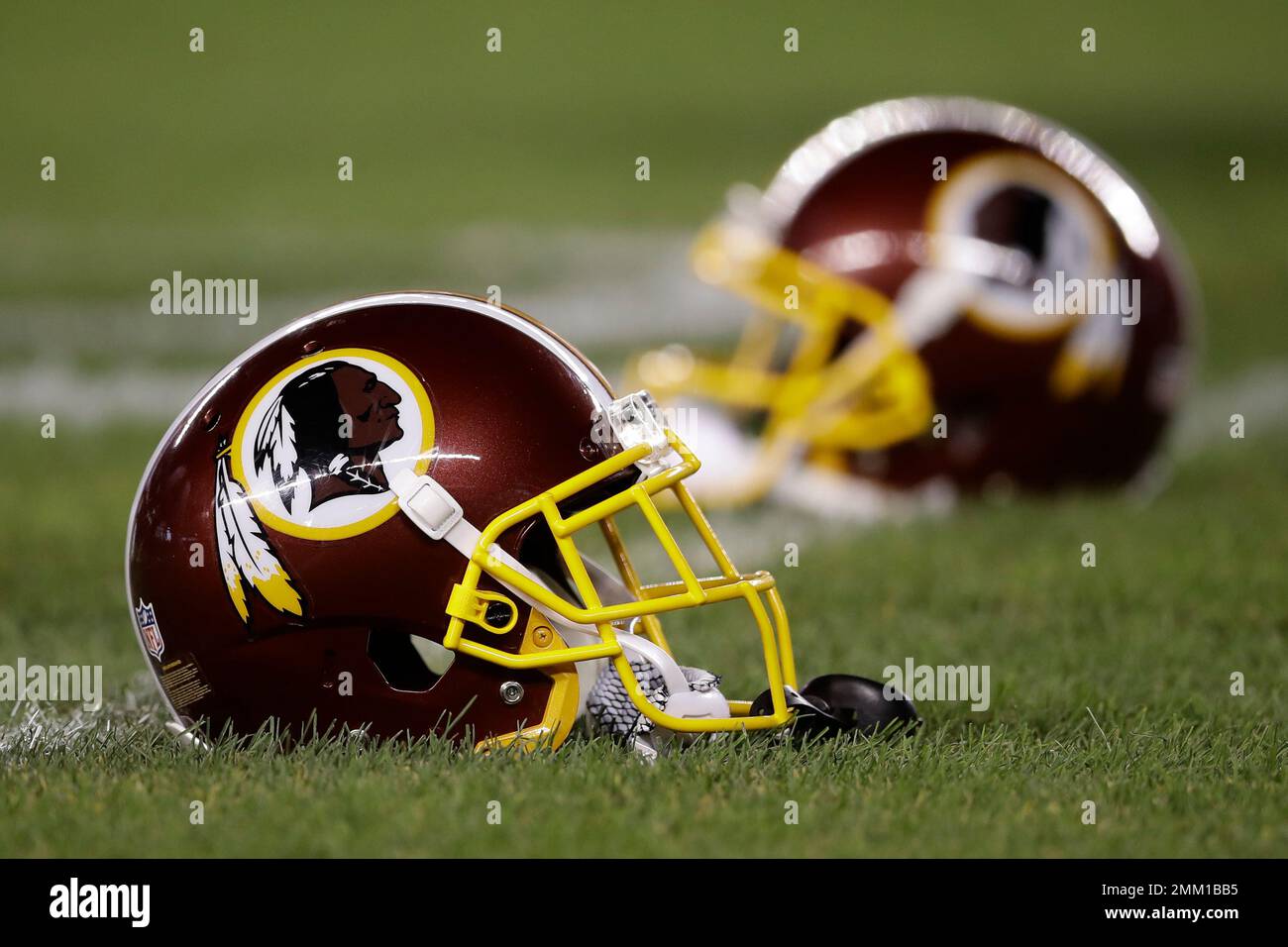 Washington Redskins' helmets are seen before an NFL football game ...