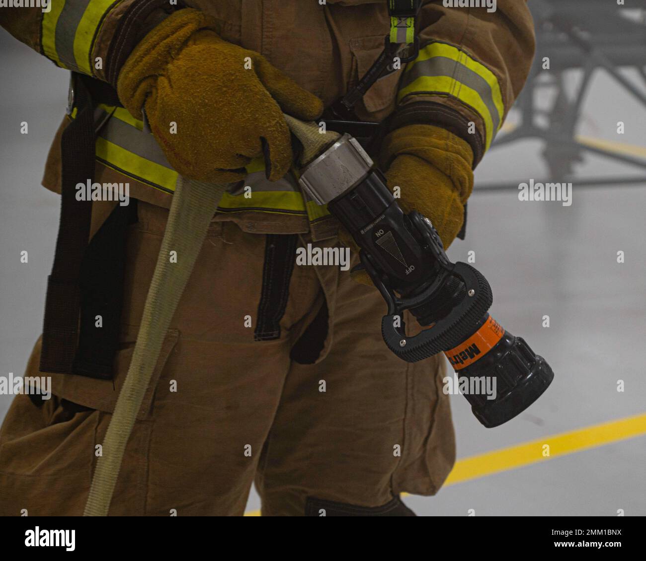 A U.S. Air Force firefighter assigned to the 36th Civil Engineer ...