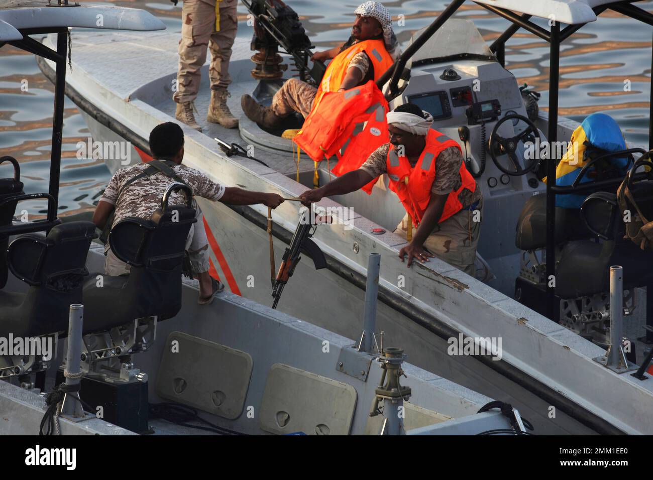In this Thursday, Nov. 29, 2018, photograph, Yemeni coast guard members ...