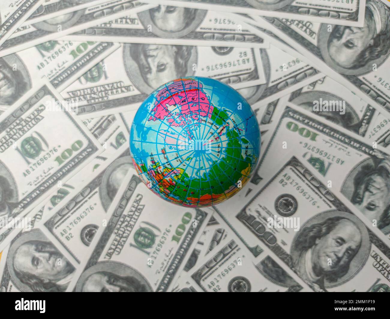 Top view earth globe on a dollar banknotes. Business concept Stock ...