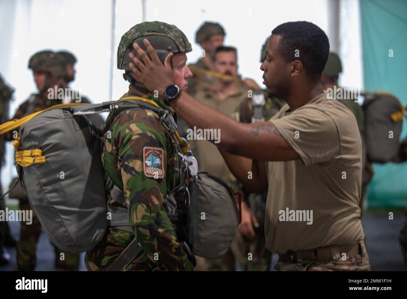A U.S. Army Jumpmaster conducts a Jumpmaster Personel Inspection (JMPI ...