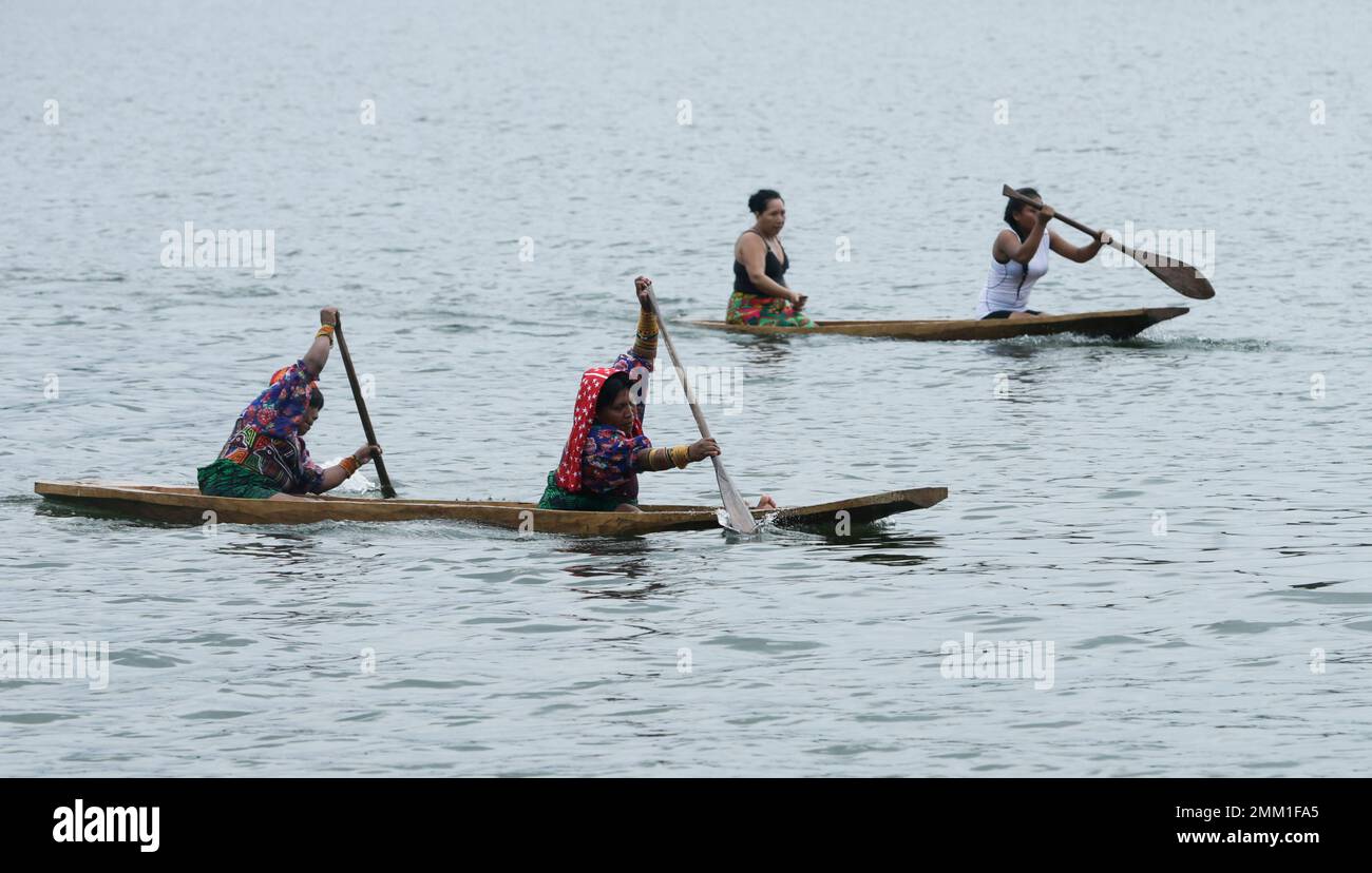 In this Nov. 25, 2018 photo, indigenous women compete in the canoe race ...