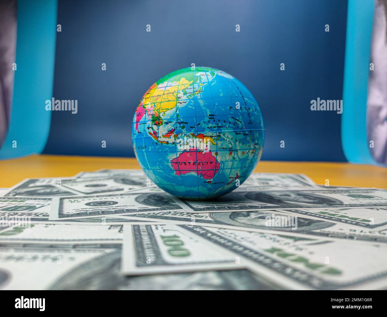 Behide the scene earth globe and banknotes shooting. Business concept ...