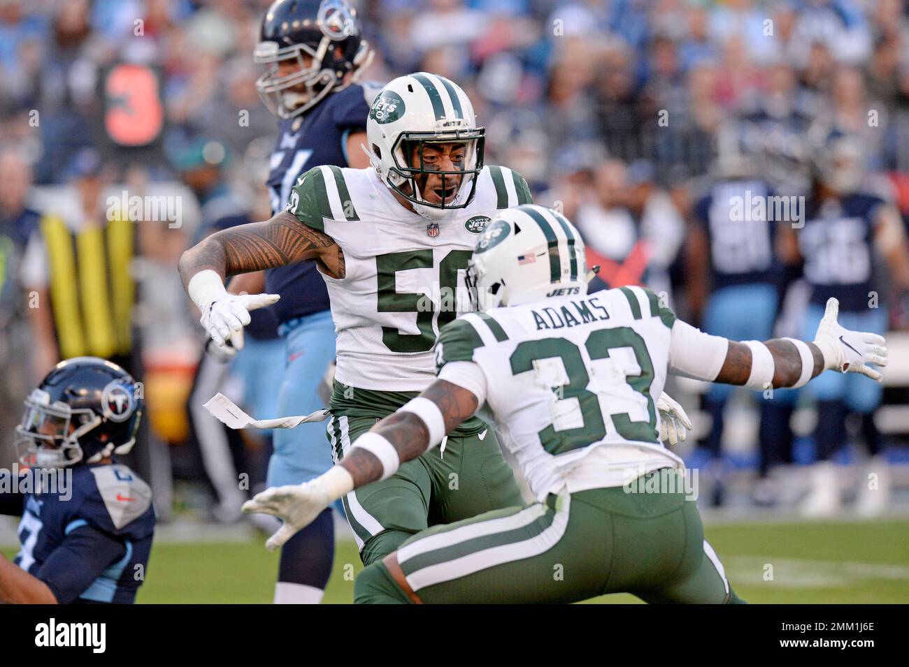 New York Jets linebacker Frankie Luvu (50) and strong safety Jamal ...