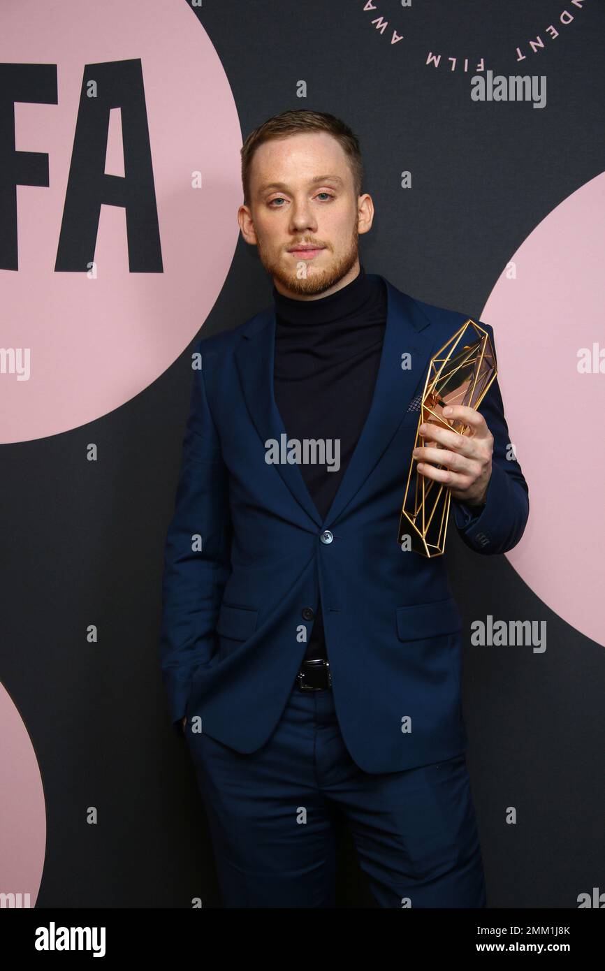 Actor Joe Cole with the award for Best Actor for his role in the film ...