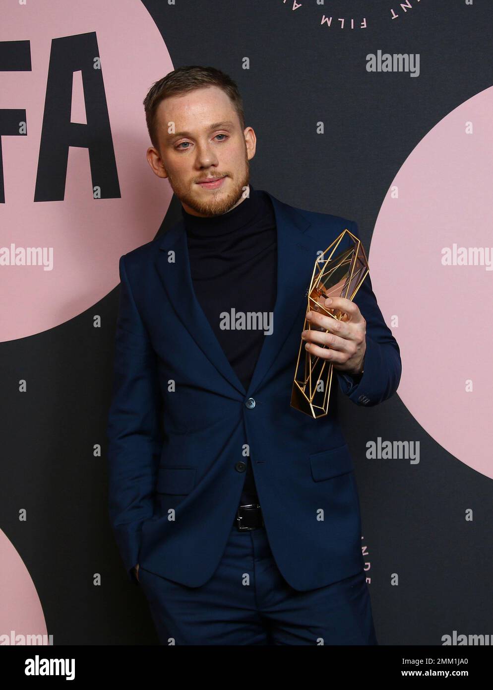 Actor Joe Cole with the award for Best Actor for his role in the film ...