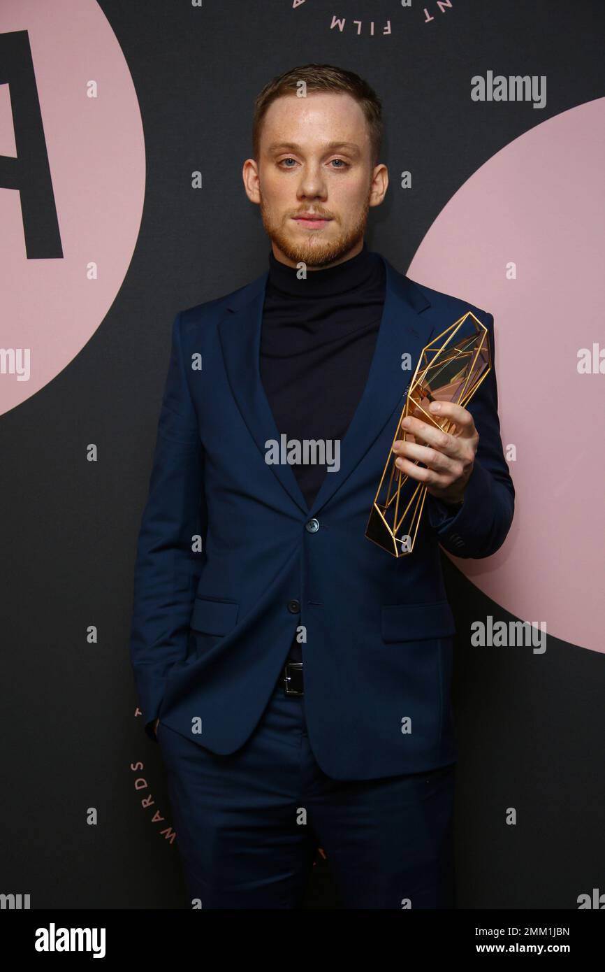 Actor Joe Cole with the award for Best Actor for his role in the film ...