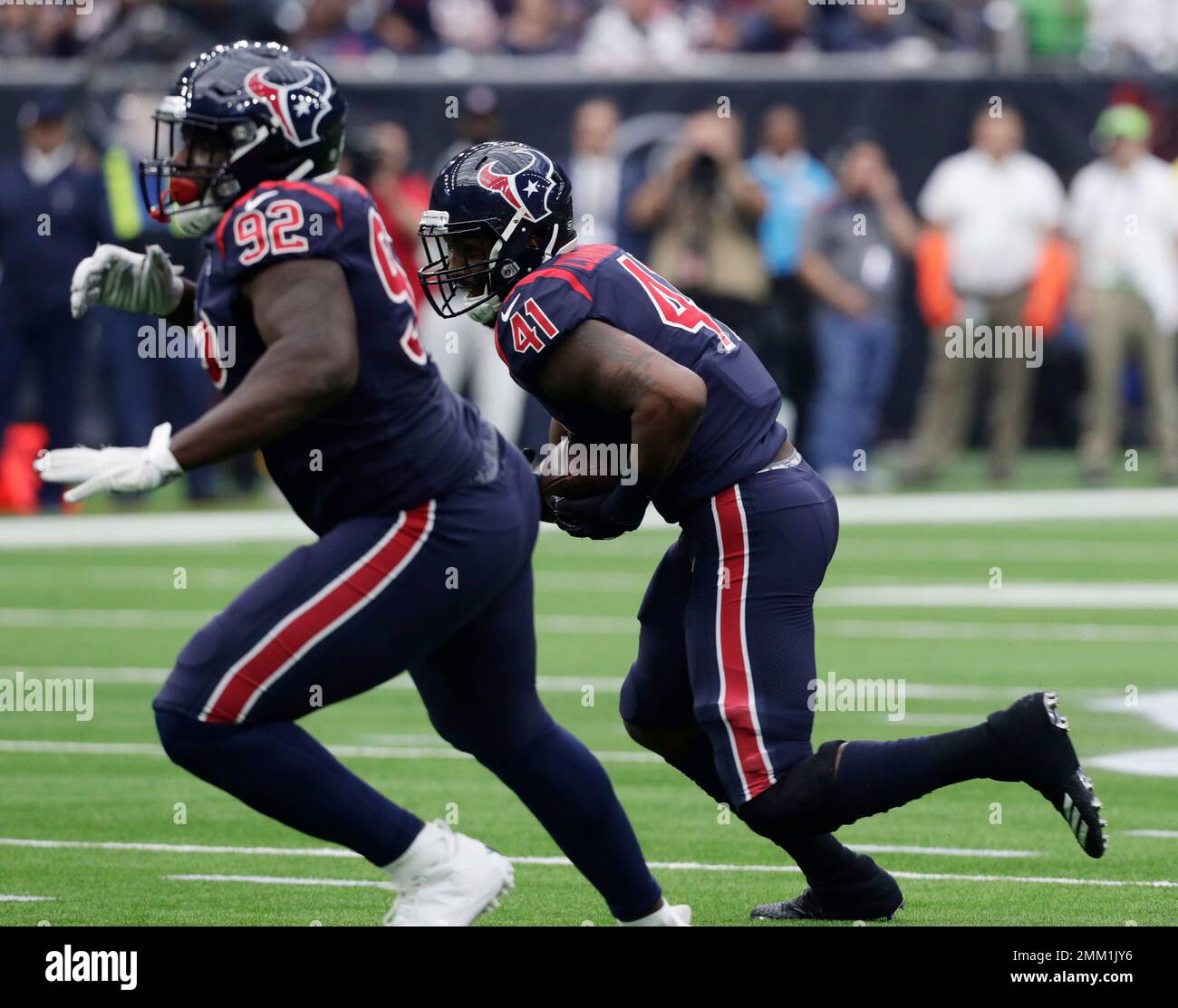 Houston Texans inside linebacker Zach Cunningham (41) return a fumble ...