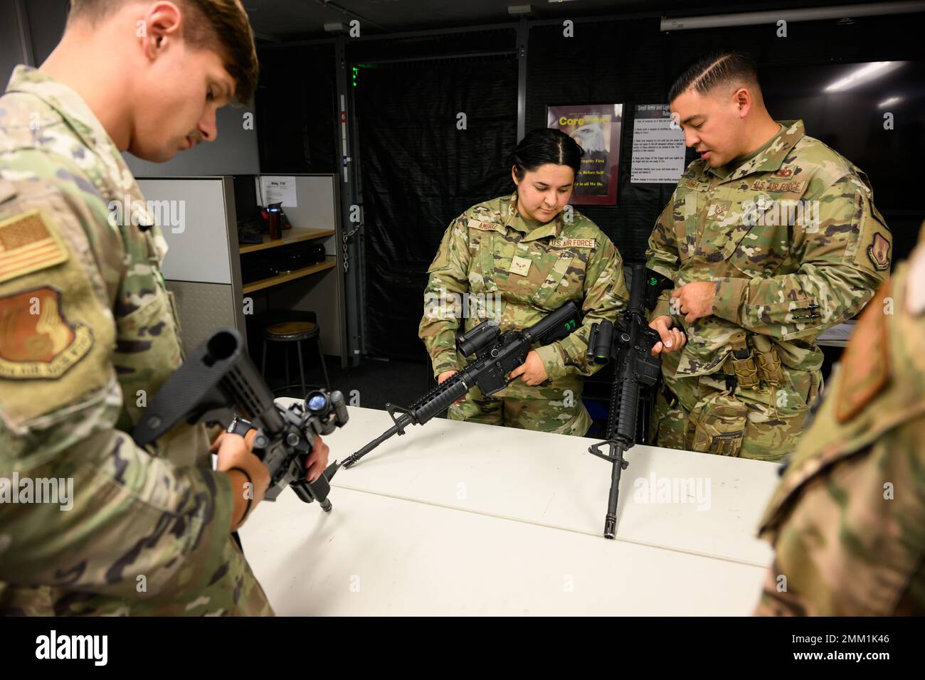 Right, Tech. Sgt. Christopher Baca, 75th Security Forces Squadron ...
