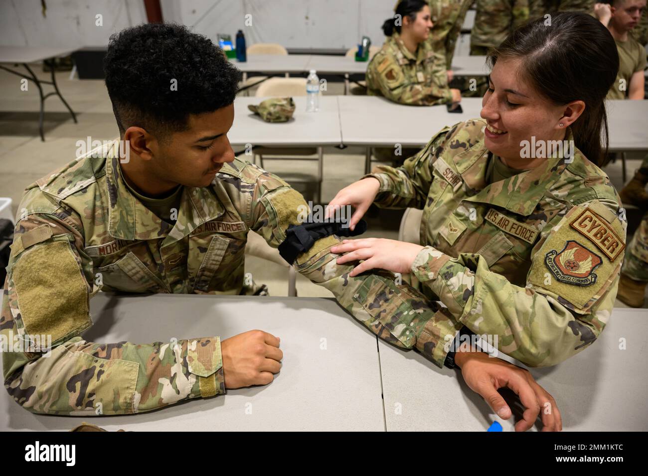 Right, Airman 1st Class Kaeli Schiff and Airman 1st Class Rafael ...