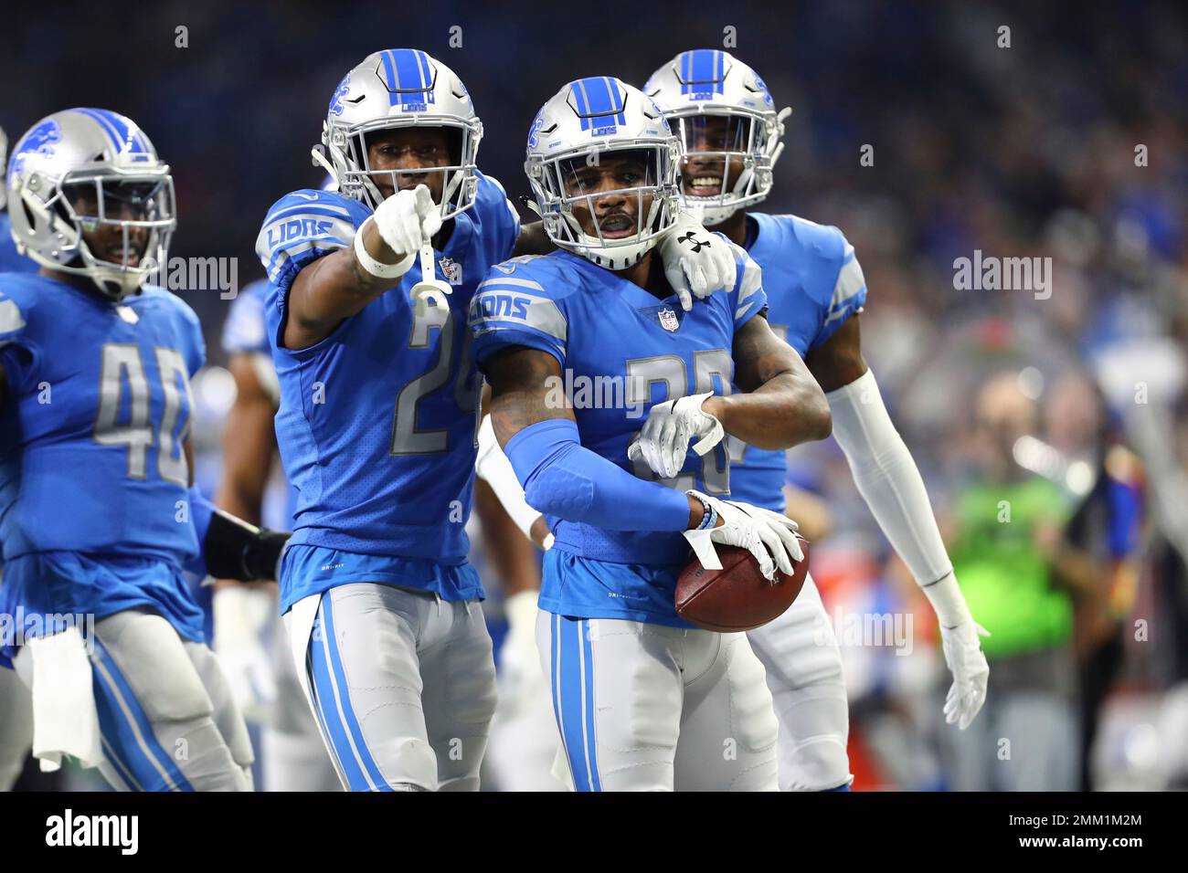 Detroit Lions strong safety Quandre Diggs (28) and teammates face the ...
