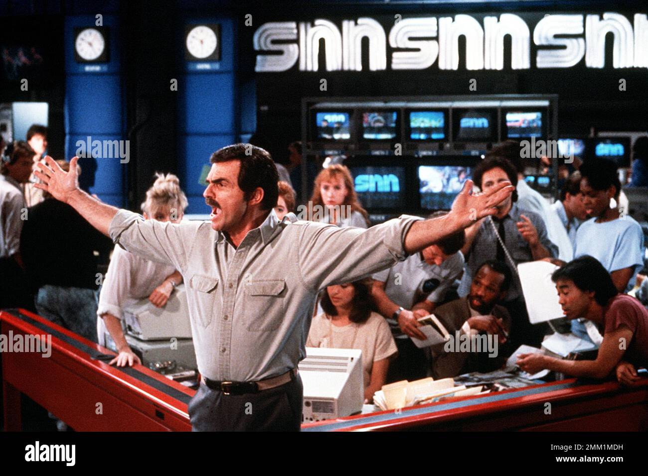 BURT REYNOLDS in SWITCHING CHANNELS (1988), directed by TED KOTCHEFF ...