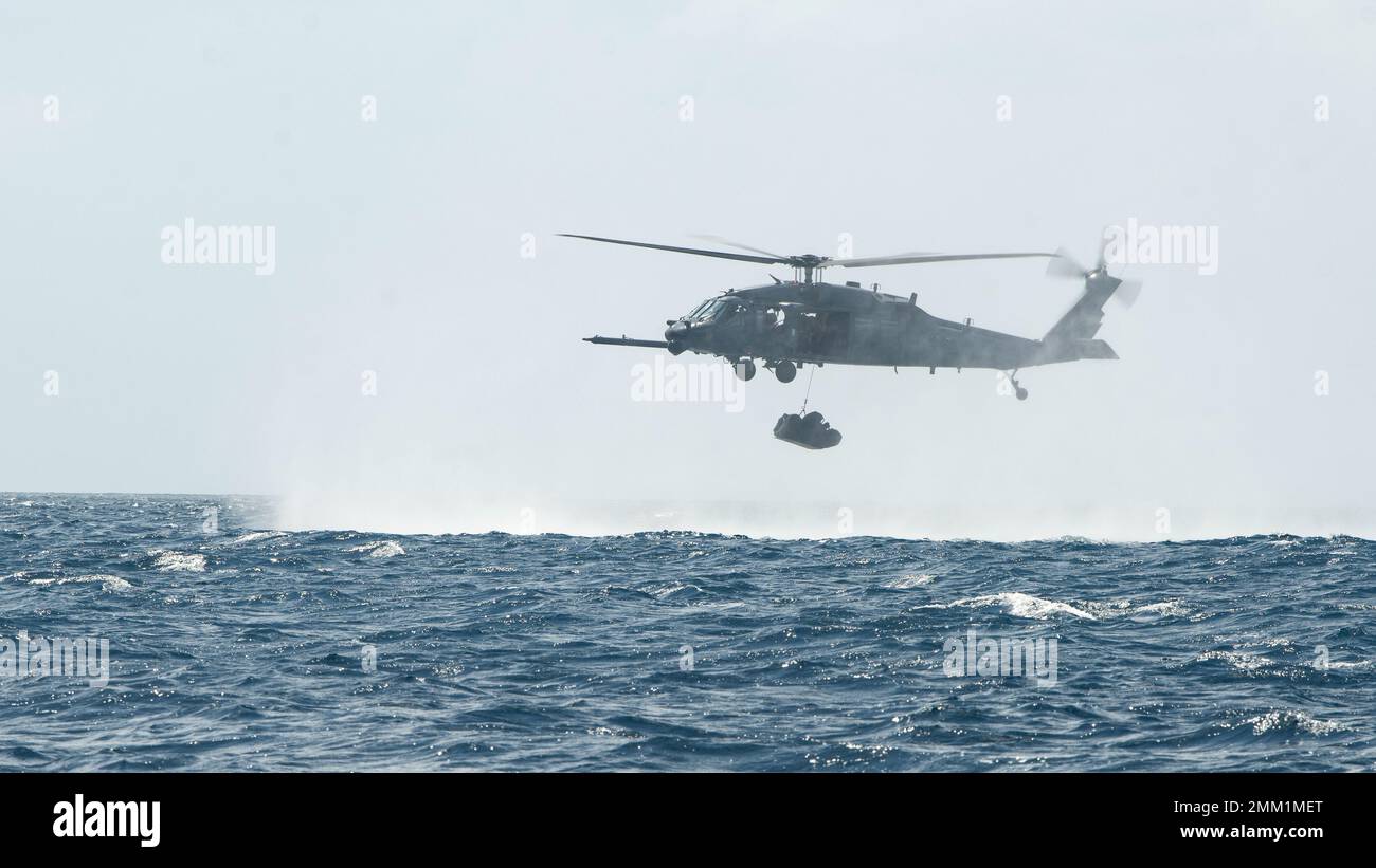 An HH-60G Pave Hawk assigned to the 33rd Rescue Squadron lowers a ...