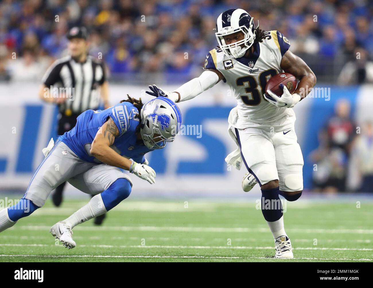 Los Angeles Rams running back Todd Gurley (30) pulls away from Detroit ...