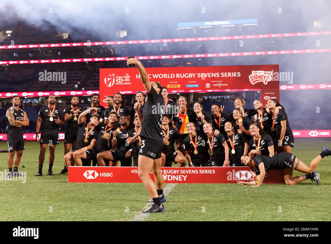 Stacey Fluhler of New Zealand takes a selfie with the Men's and Women's ...