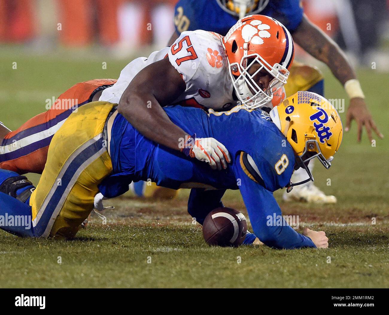 Clemson's Tre Lamar (57) sacks Pittsburgh's Kenny Pickett (8) in the ...