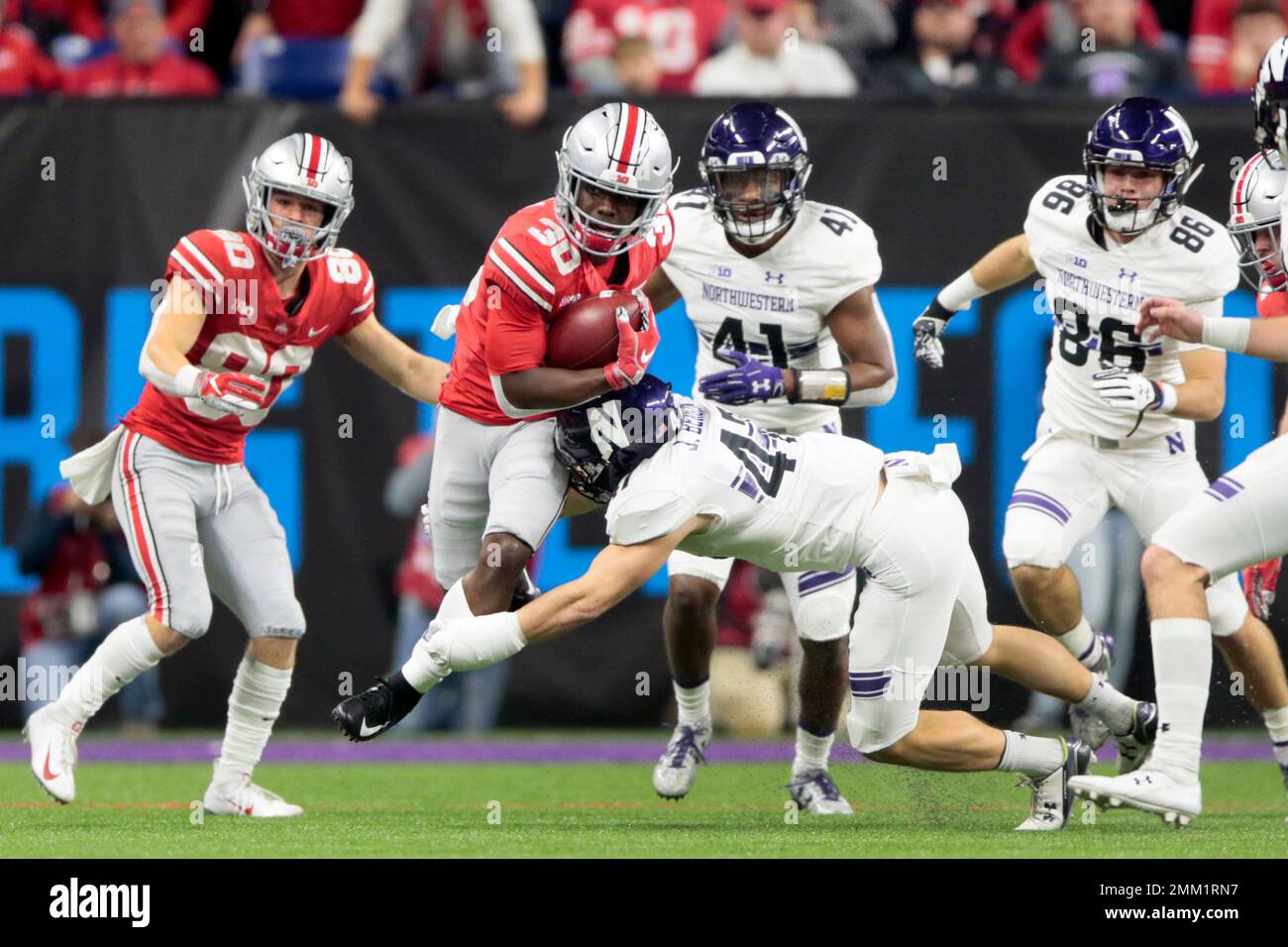 Ohio State running back Demario McCall (30) is tackled by Northwestern ...