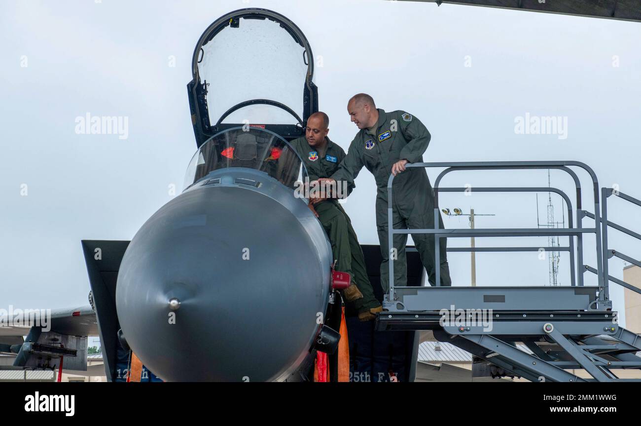 U.S. Air Force Col. Mansour Elhihi, left, commander, 125th Operations ...