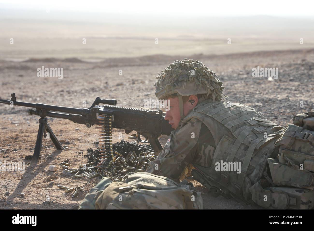 Soldiers from the British Army conduct a live-fire exercise with their ...