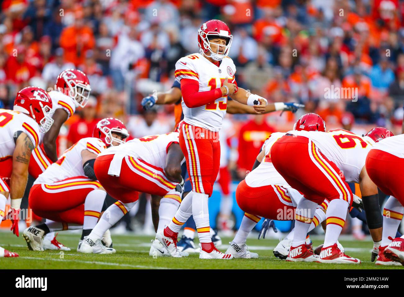Kansas City Chiefs quarterback Patrick Mahomes signals against the ...