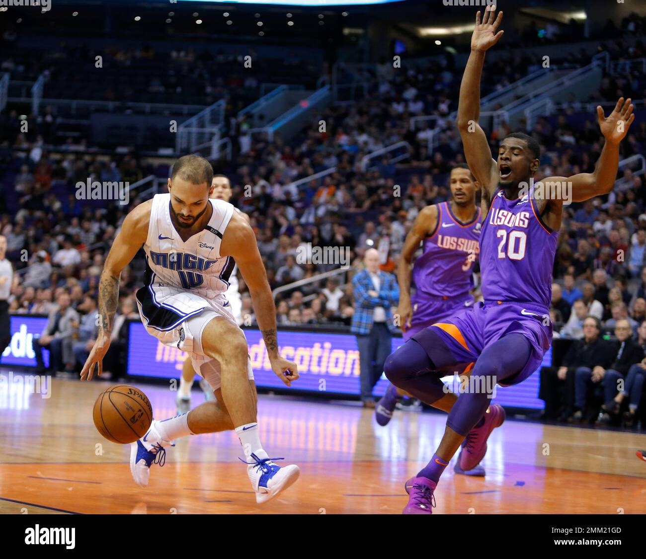 Phoenix Suns forward Josh Jackson (20) draws the offensive foul on ...
