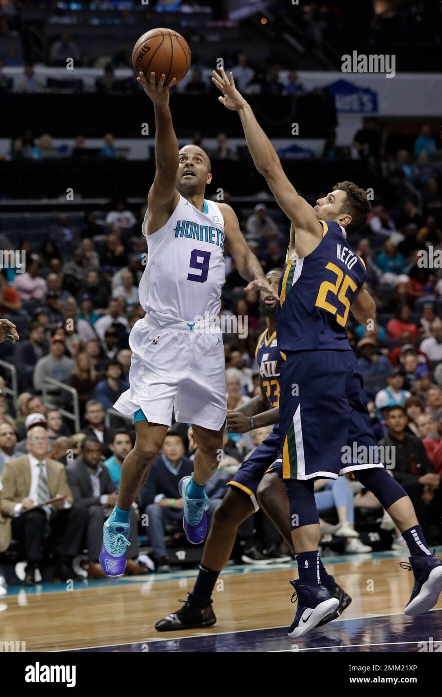 Charlotte Hornets' Tony Parker (9) drives against Utah Jazz's Raul Neto ...