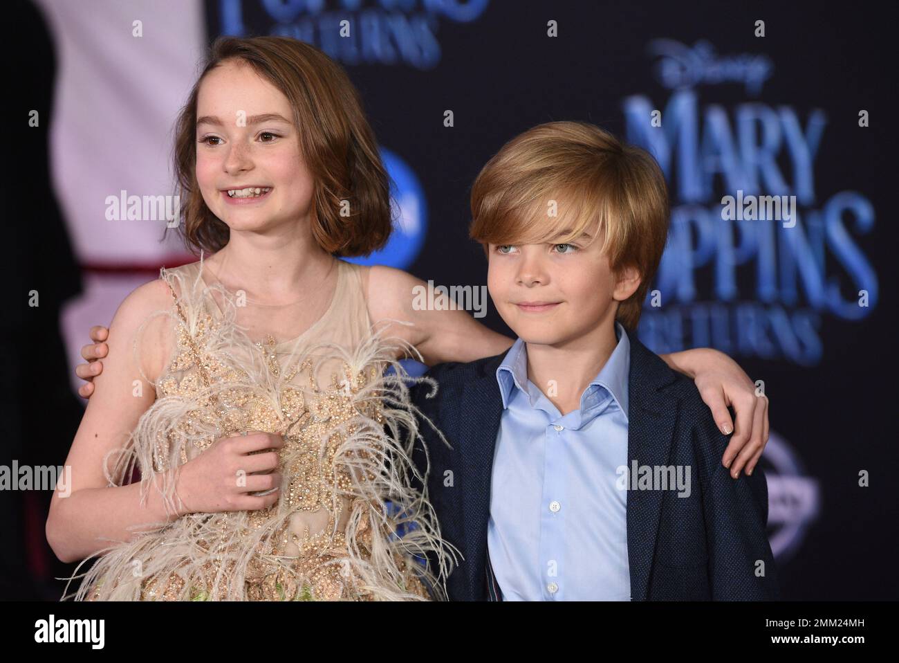 Pixie Davies, left, and Joel Dawson, cast members in "Mary Poppins Returns," pose together at ...