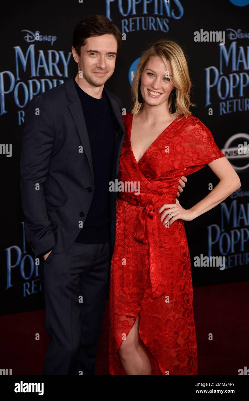 Actor Topher Grace and his wife, actress Ashley Hinshaw, pose together ...