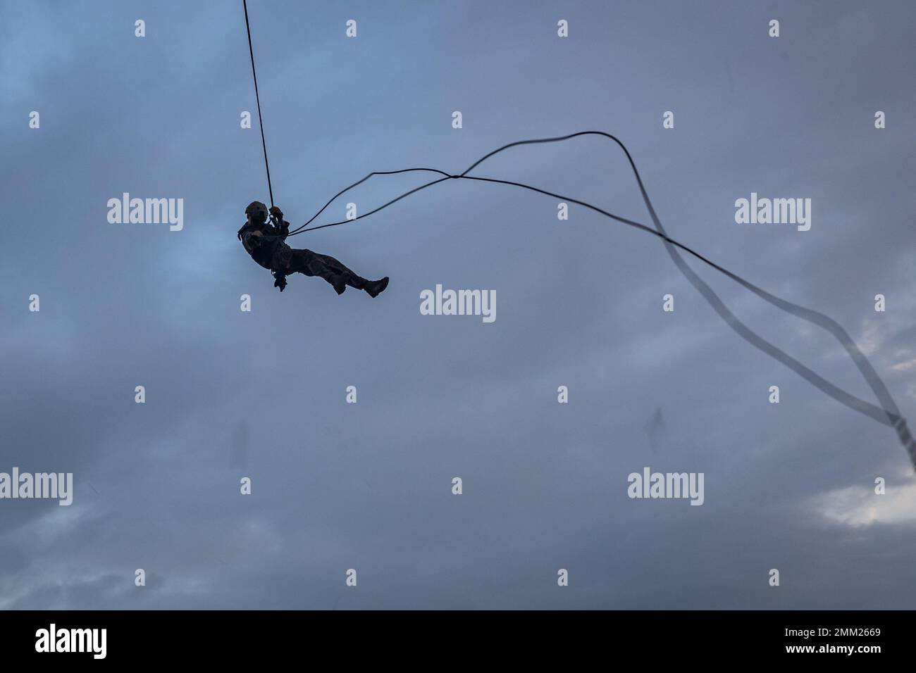 U.S. Marines with III Marine Expeditionary Force (MEF) rappel from an ...