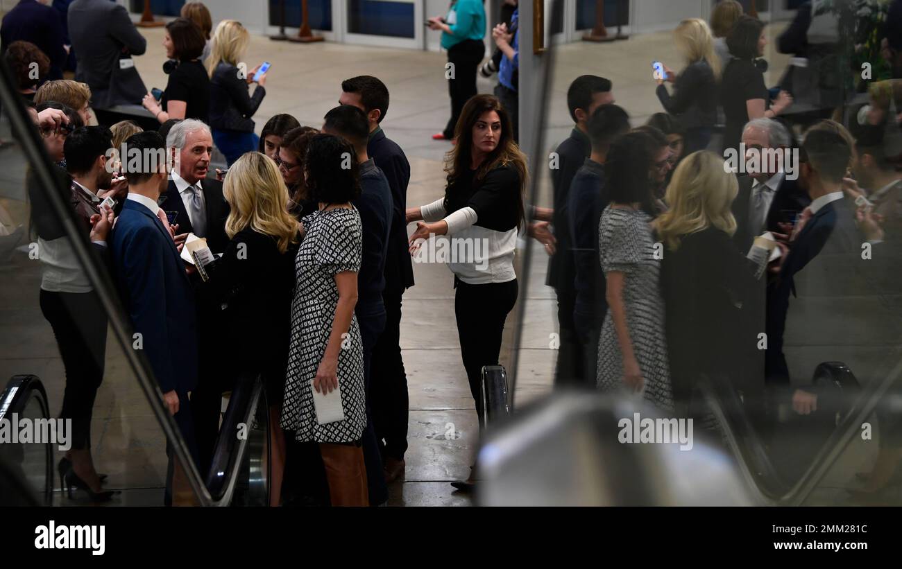Sen. Bob Corker, R-Tenn., talks with reporters as he heads to a vote on ...