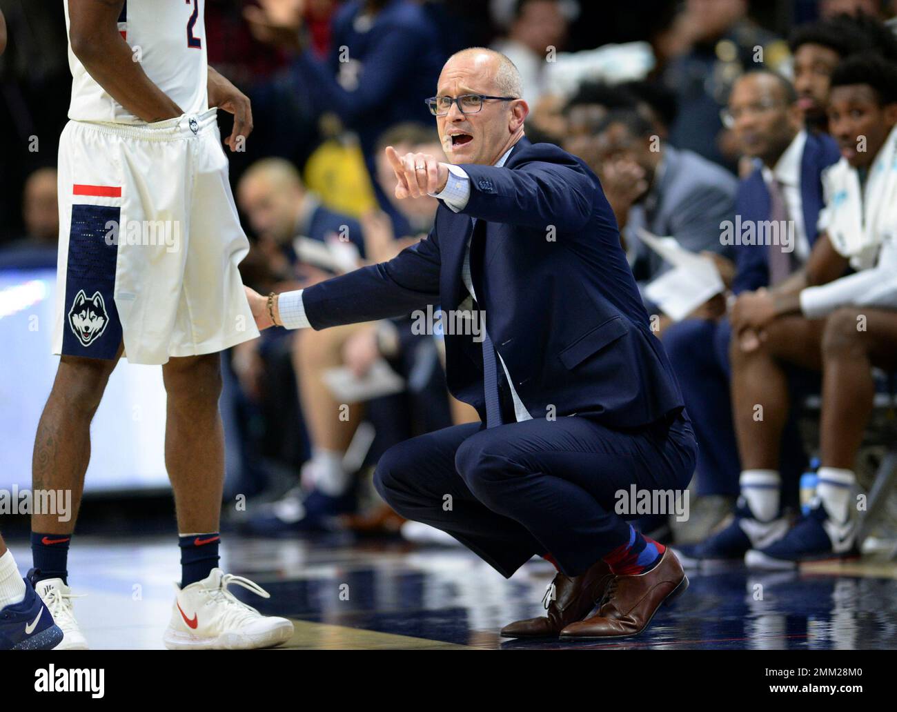 Connecticut head coach Dan Hurley directs Tarin Smith (2) during a ...