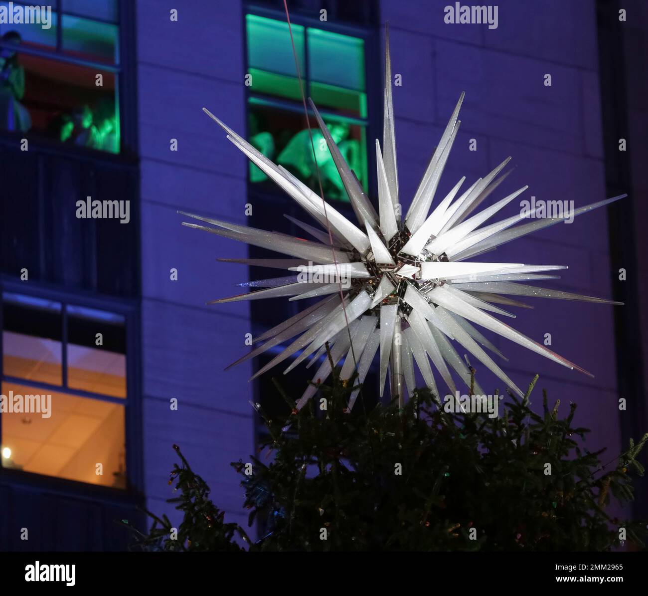 The Swarovski Star tree topper is seen during the 86th annual ...