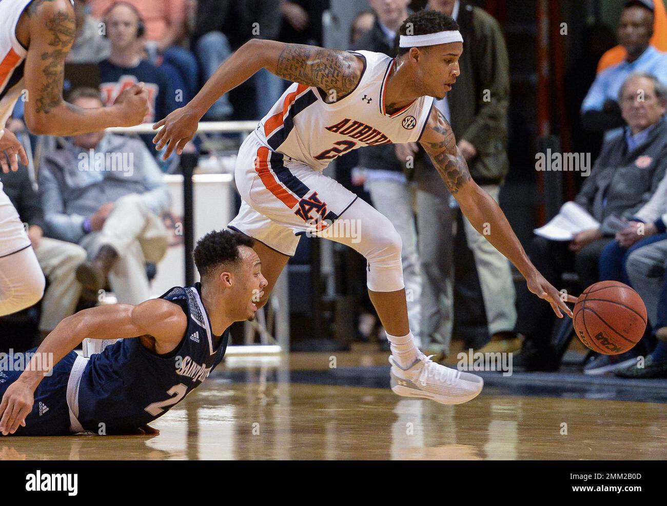 Auburn guard Bryce Brown (2) snags a loose ball from Saint Peter's ...