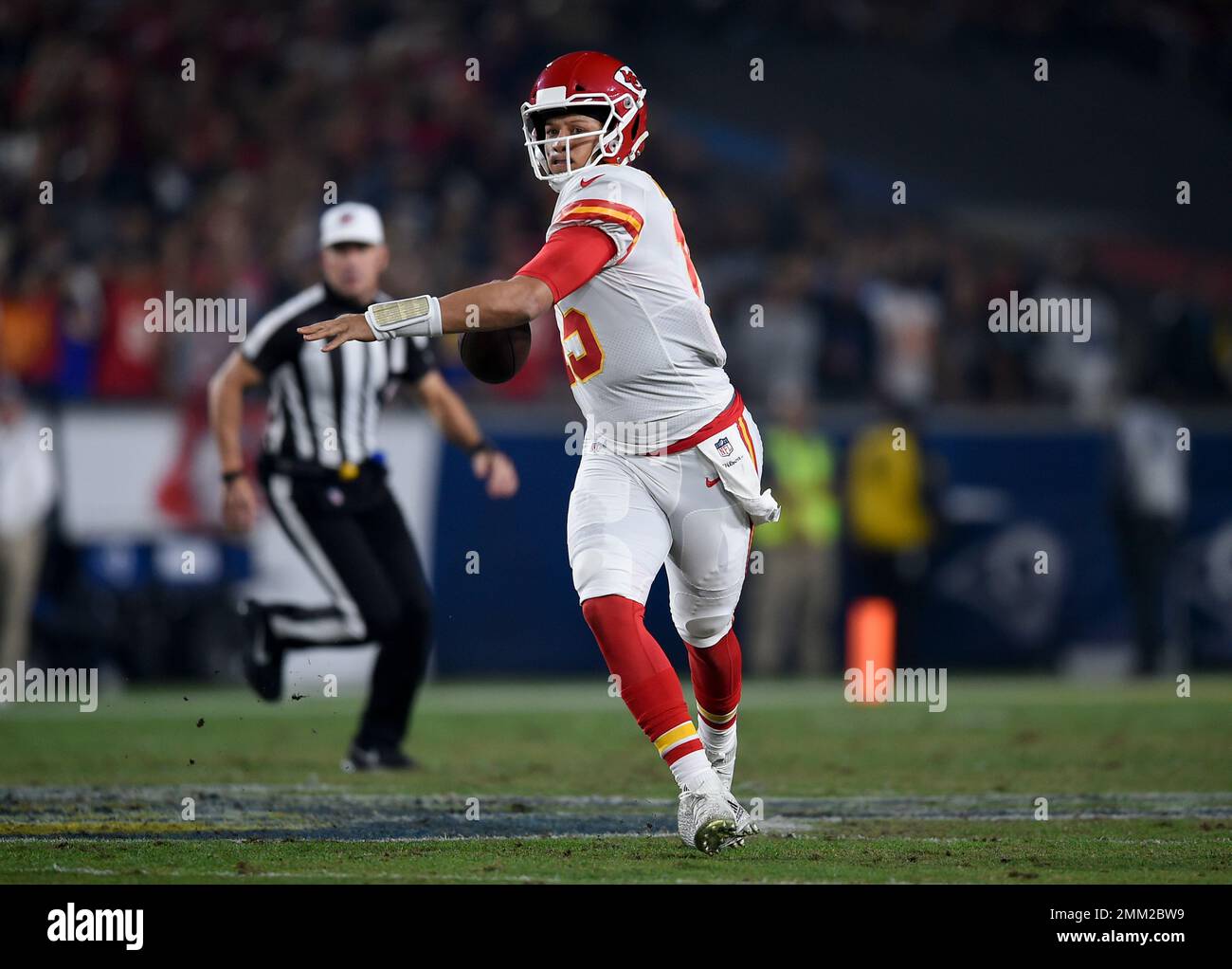 Kansas City Chiefs quarterback Patrick Mahomes looks to pass against ...