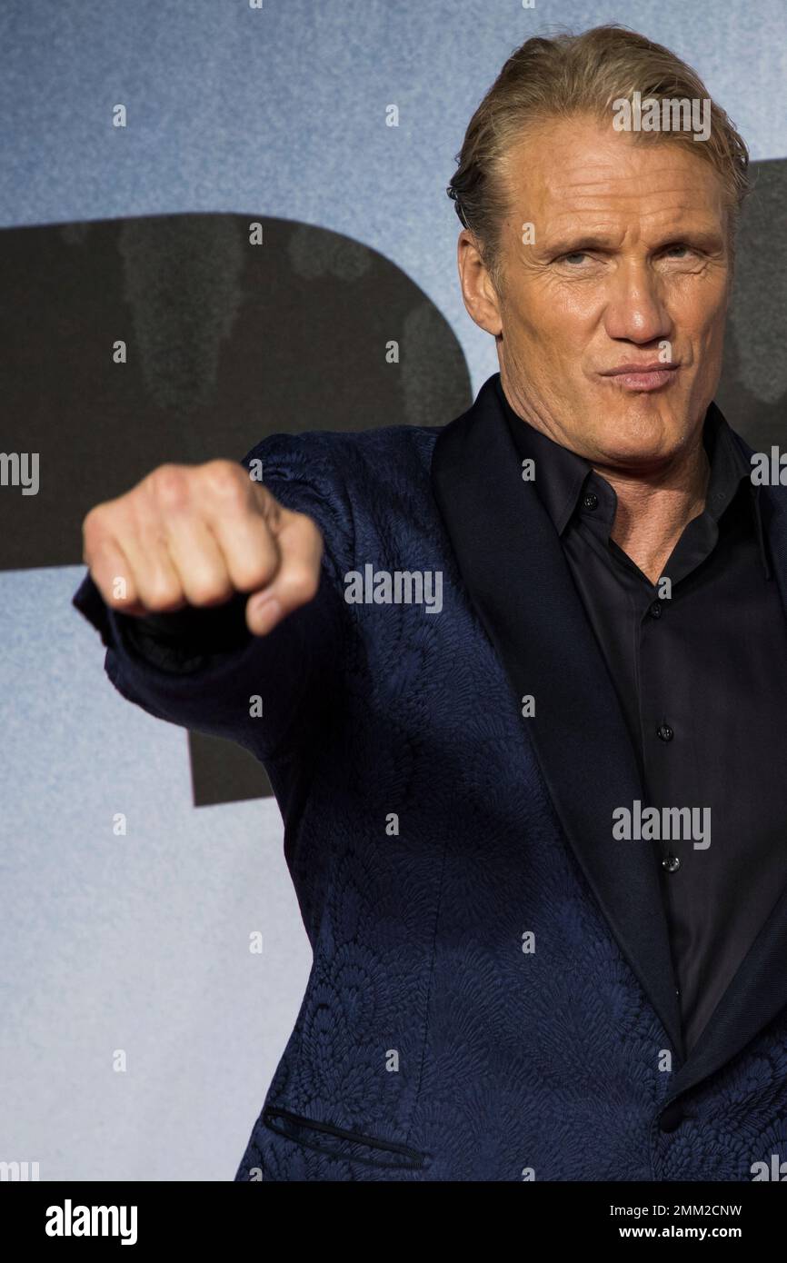 Actor Dolph Lundgren poses for photographers upon arrival at the ...