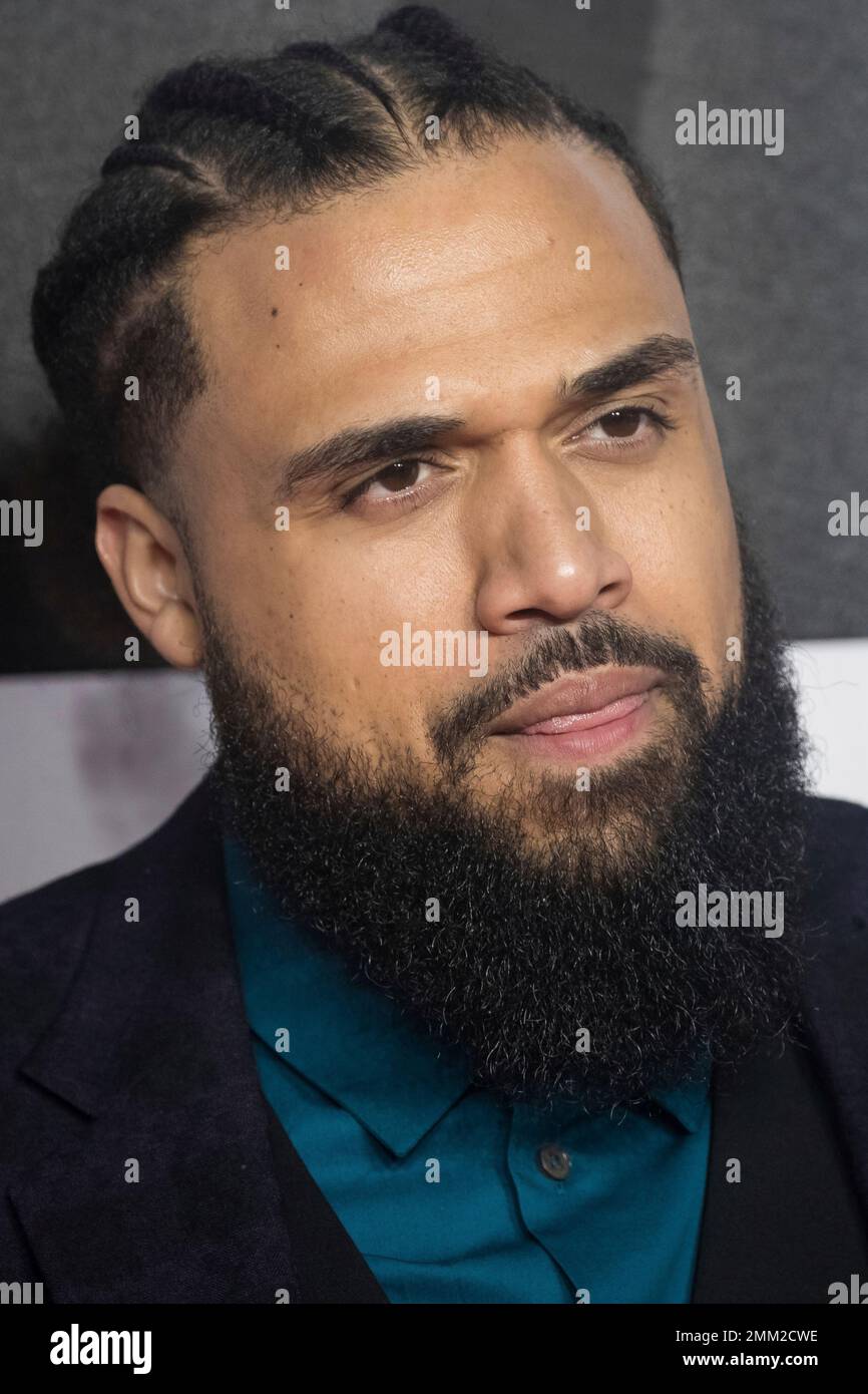 Director Steven Caple Jr. poses for photographers upon arrival at the ...
