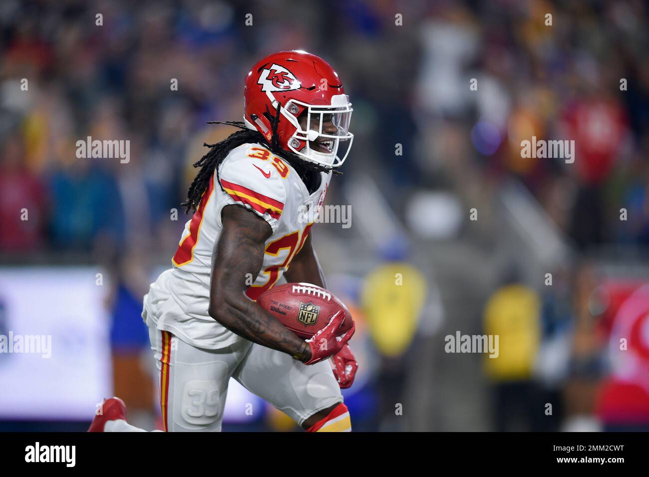 Kansas City Chiefs defensive back Tremon Smith returns a kick off ...