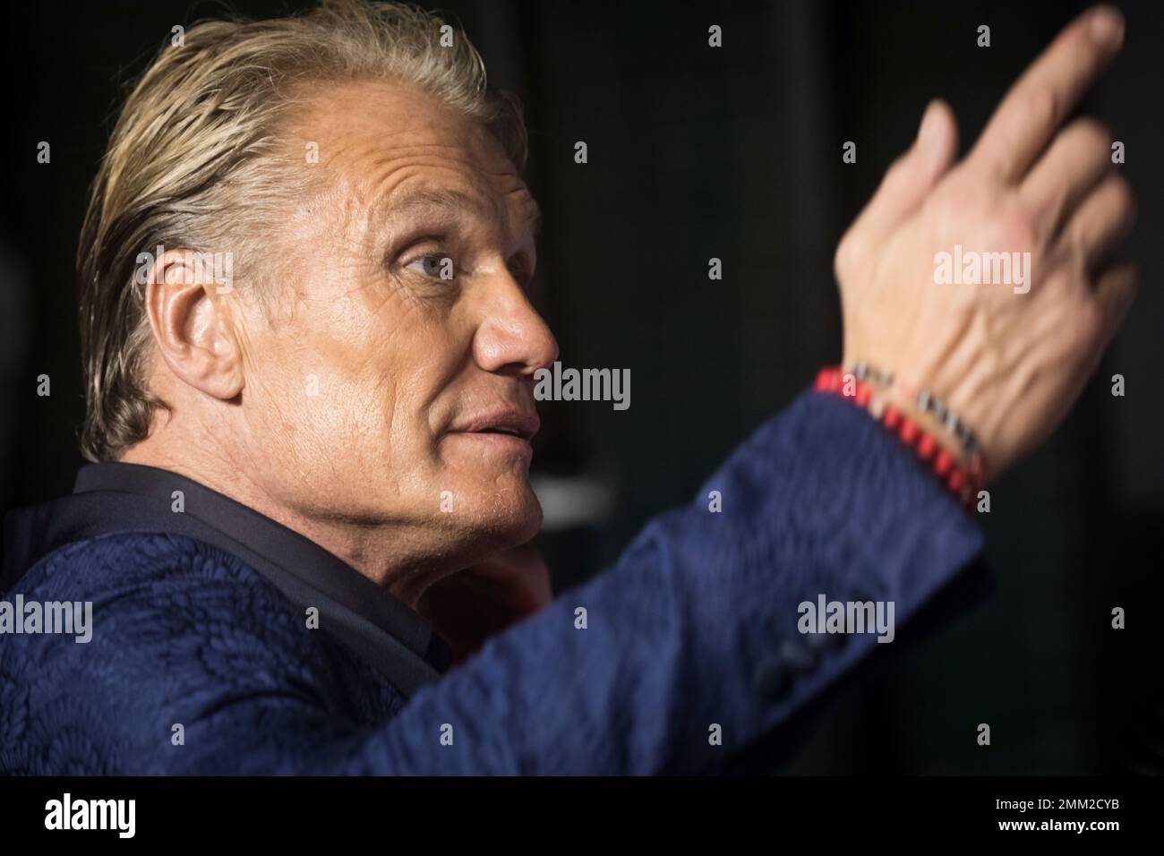 Actor Dolph Lundgren poses for photographers upon arrival at the ...