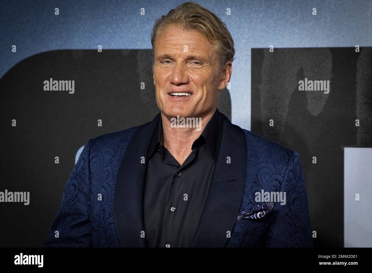 Actor Dolph Lundgren poses for photographers upon arrival at the ...