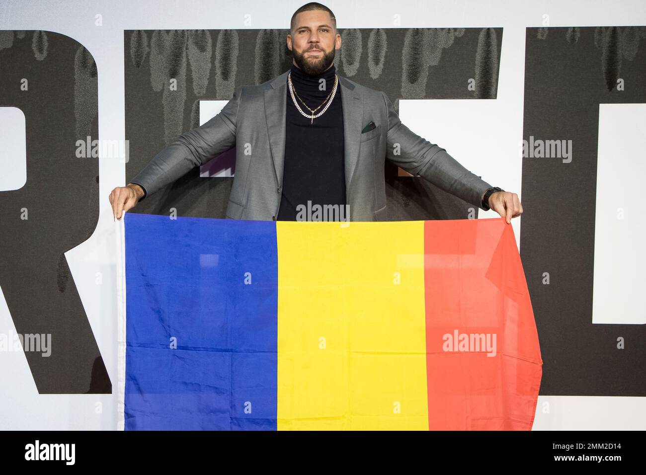 Actor Florian Munteanu poses for photographers upon arrival at the ...