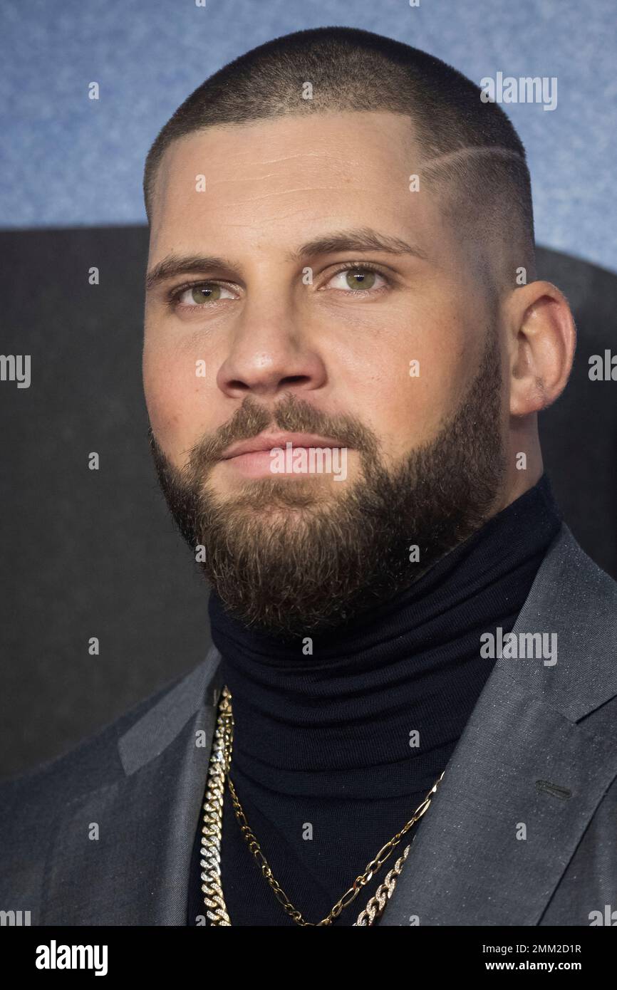Actor Florian Munteanu poses for photographers upon arrival at the ...