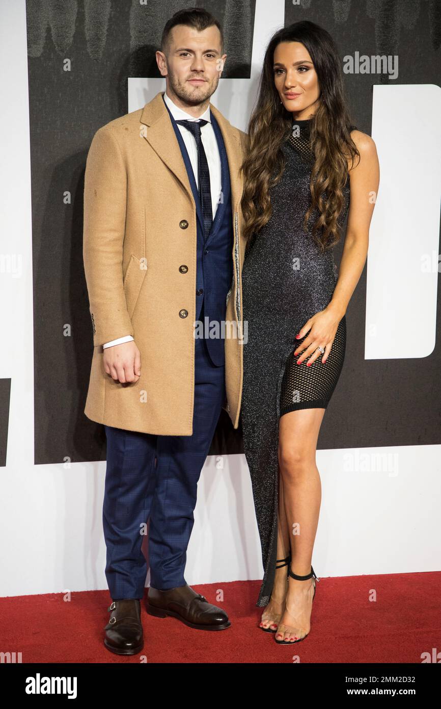Jack Wilshere and Andriani Michael pose for photographers upon arrival ...