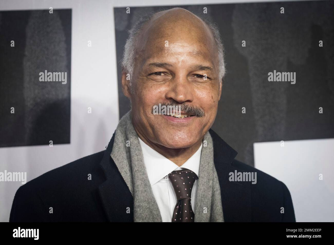 Actor John Conteh poses for photographers upon arrival at the premiere ...