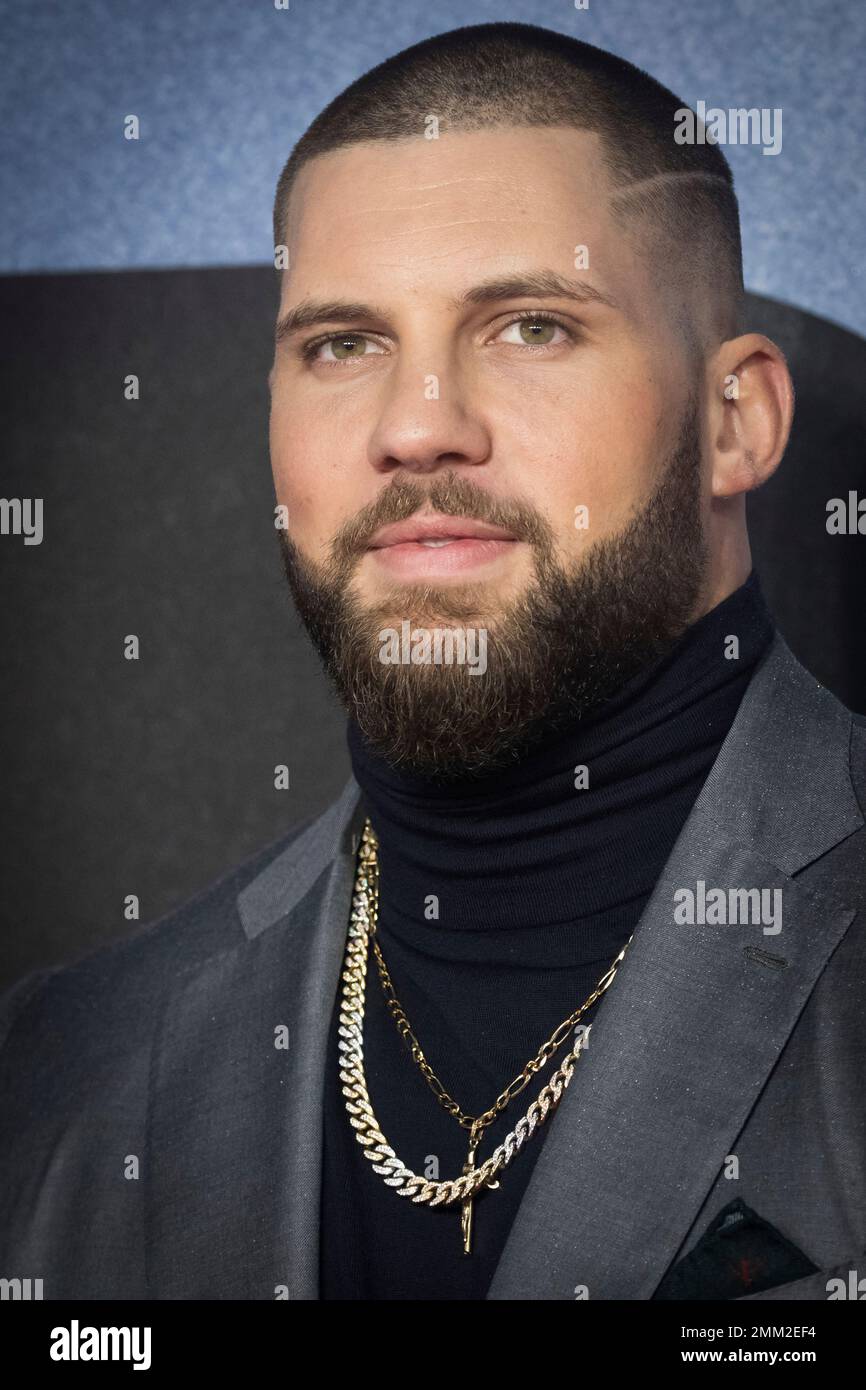 Actor Florian Munteanu poses for photographers upon arrival at the ...
