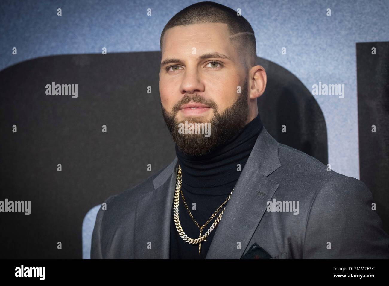 Actor Florian Munteanu poses for photographers upon arrival at the ...