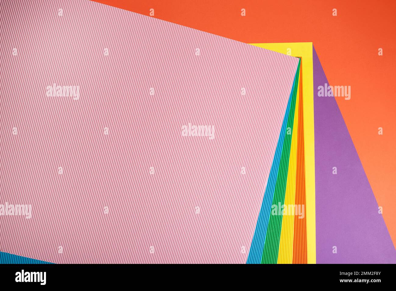 Abstract background of sheets of colored paper, for decoration, for ...