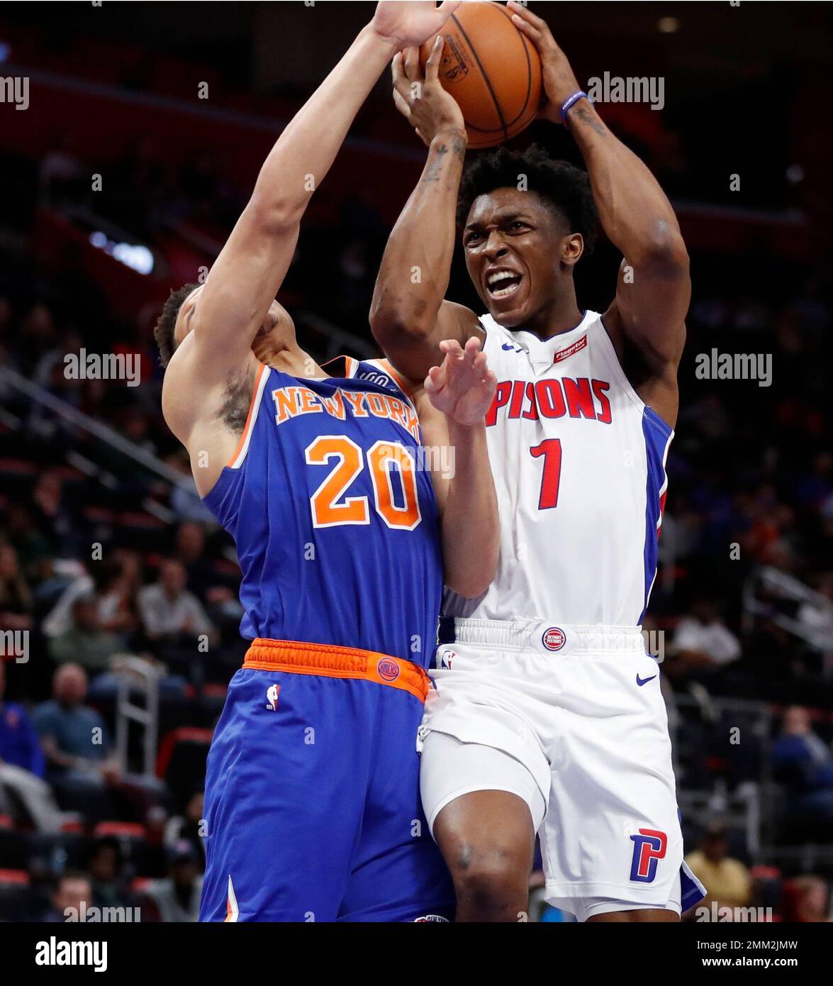 Detroit Pistons forward Stanley Johnson (7) is defended by New York ...