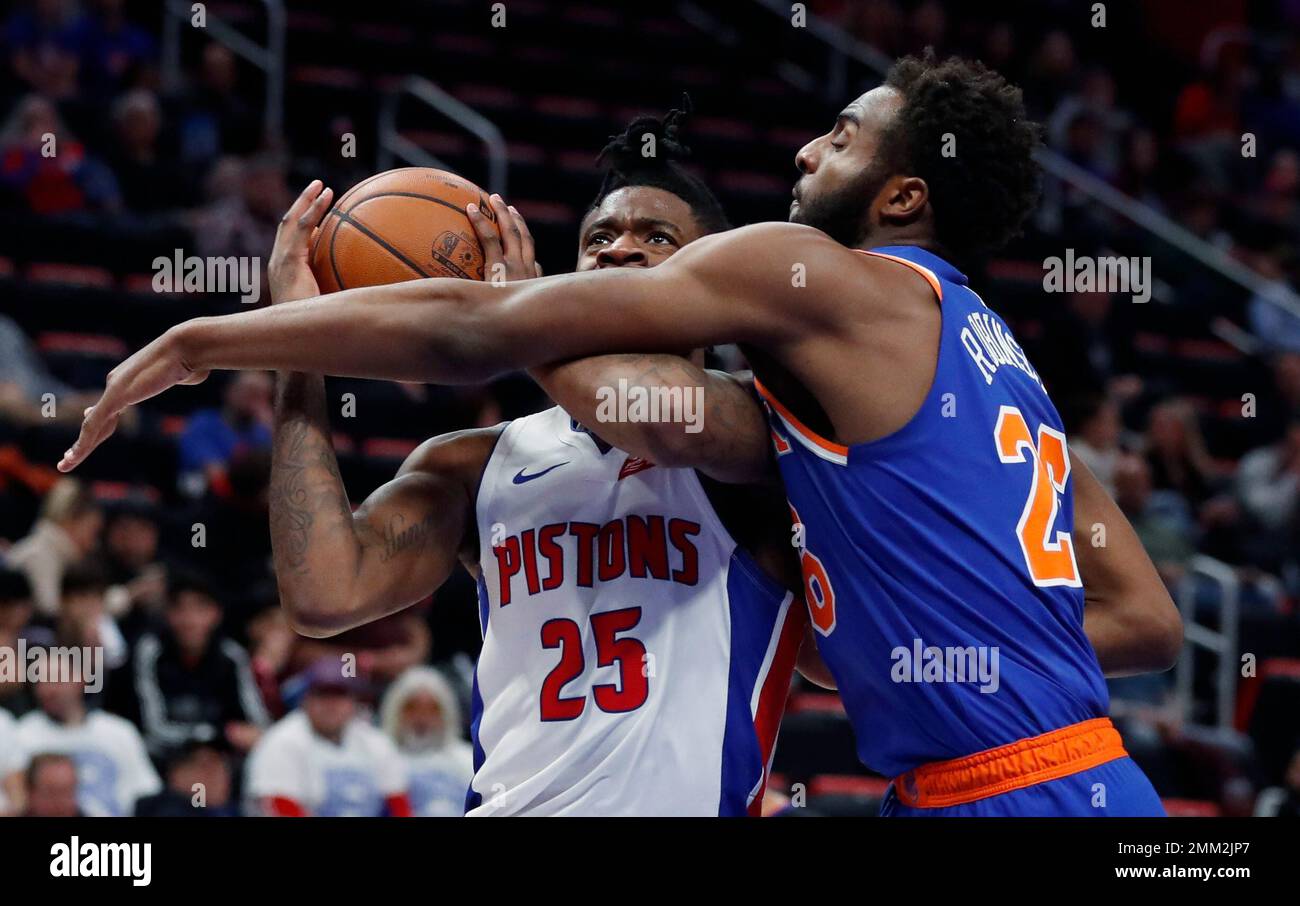 Detroit Pistons guard Reggie Bullock (25) is fouled by New York Knicks ...