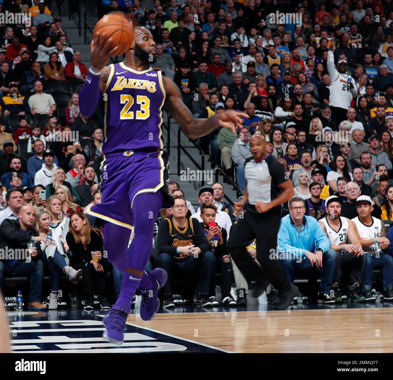 Los Angeles Lakers forward LeBron James saves the ball from bouncing ...